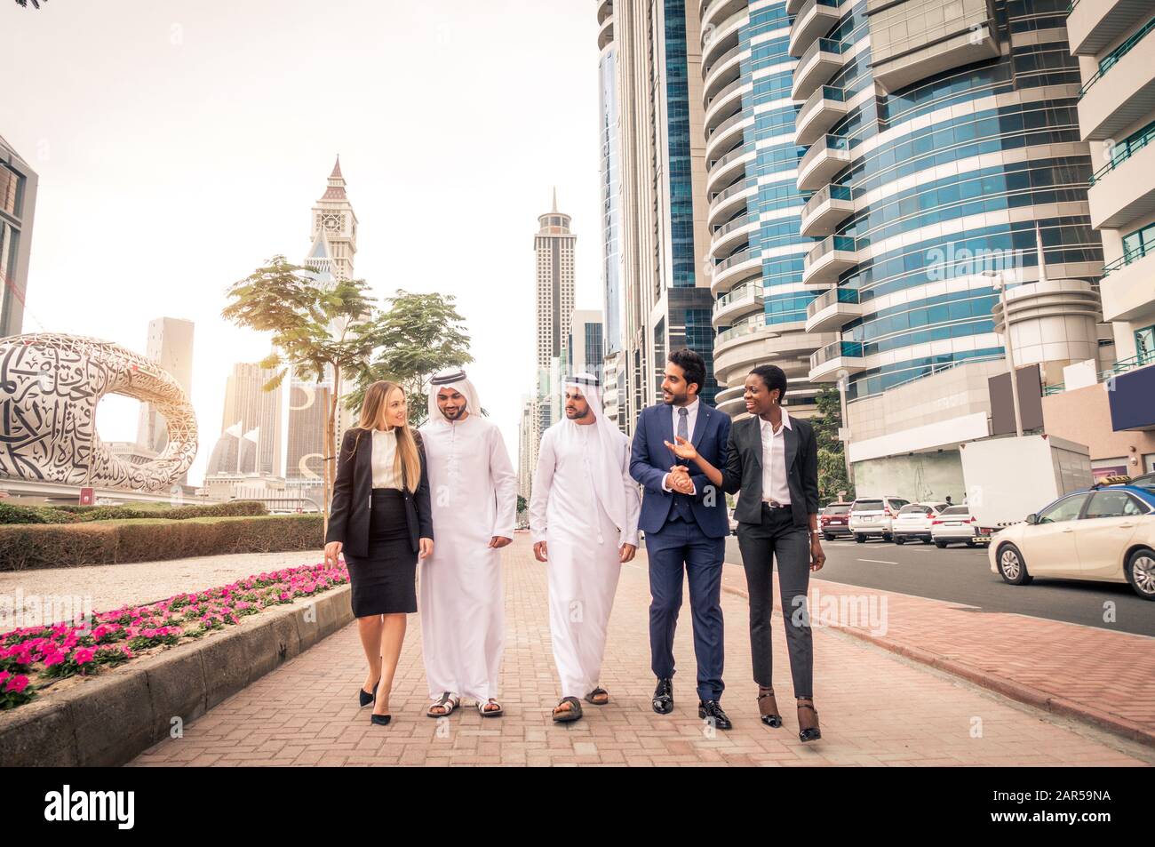 Multi-ethnic group of people on a business meeting in the UAE ...