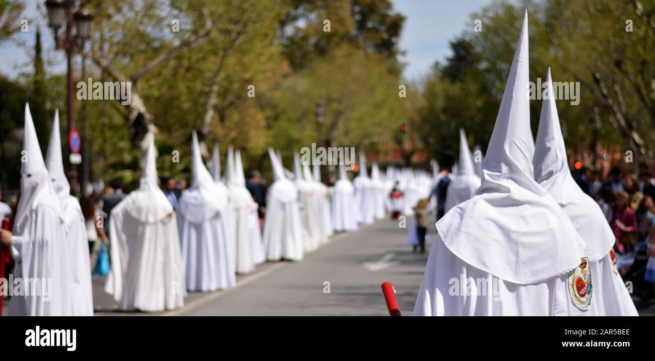 the great procession of hooded people Stock Photo - Alamy