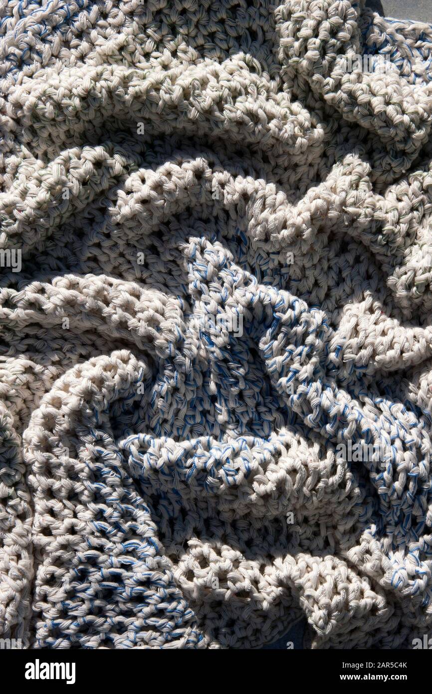 Handmade wool knitted fabric of recycled material Stock Photo - Alamy