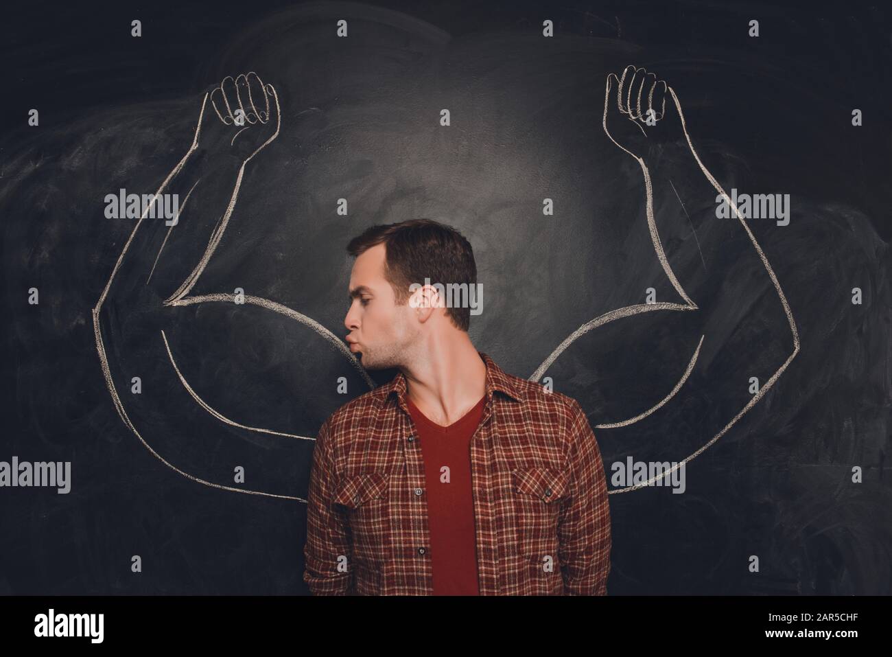 Man kissing his muscle hi-res stock photography and images - Alamy