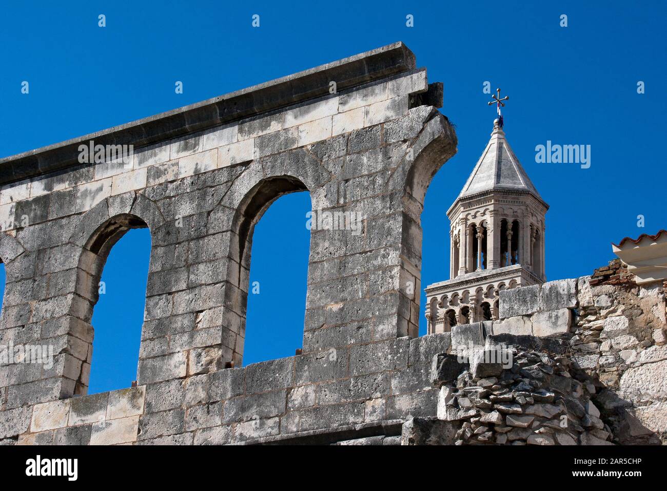 The wall above silver gate and bell tower of cathedral of St Domnius ...