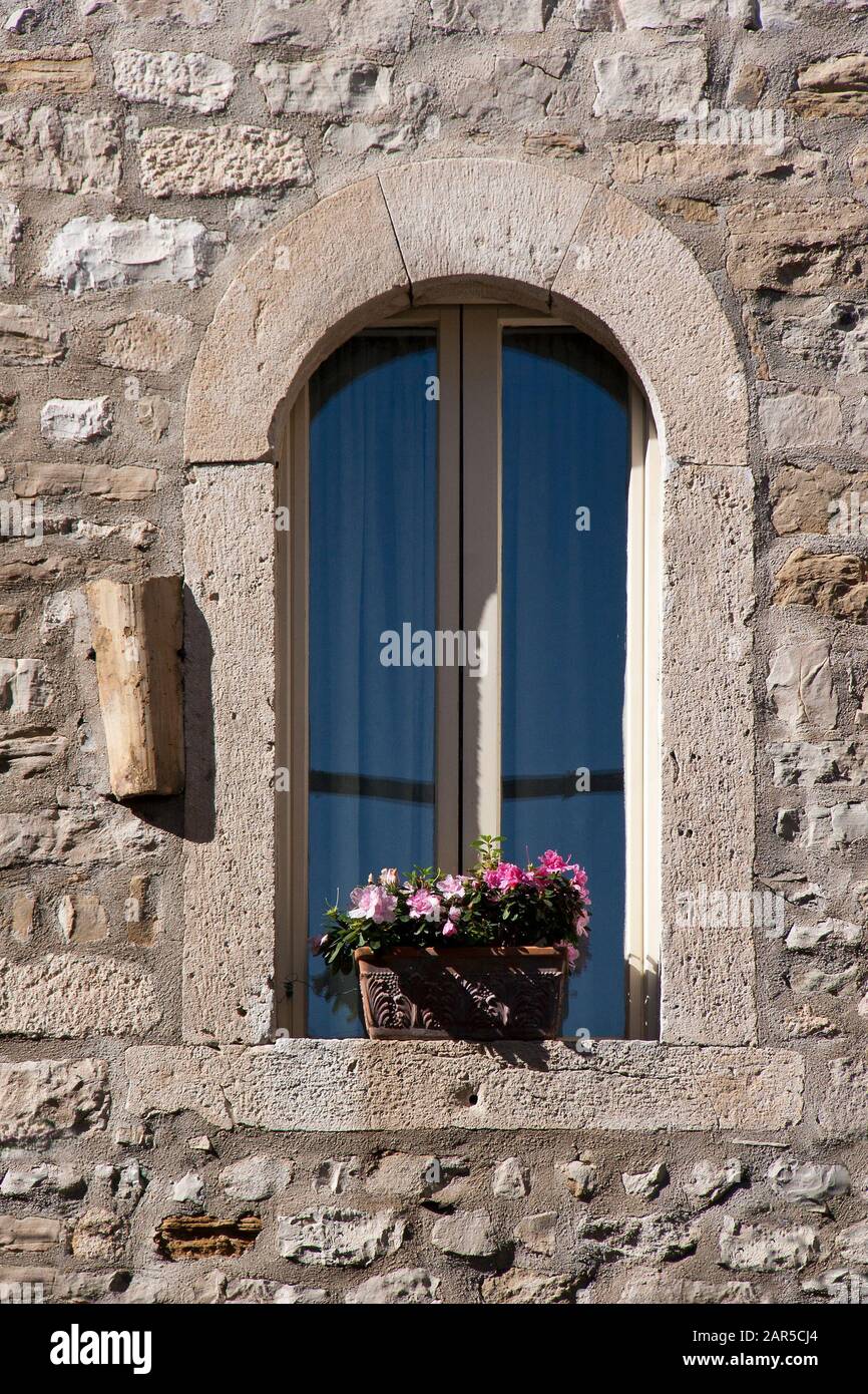 Rounded window on the wall inside of Diocletian palace Stock Photo - Alamy