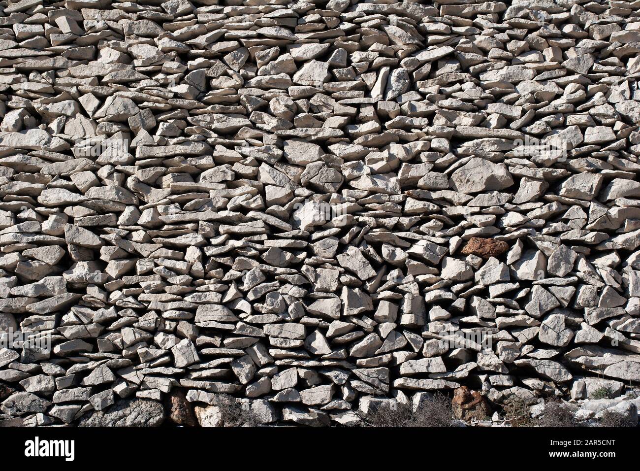 Traditional construction of stone wall without binding material Stock ...