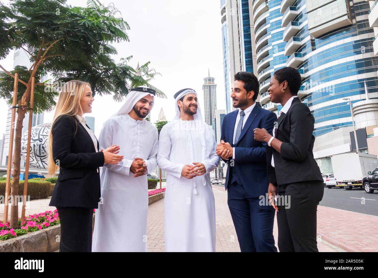Multi-ethnic group of people on a business meeting in the UAE ...