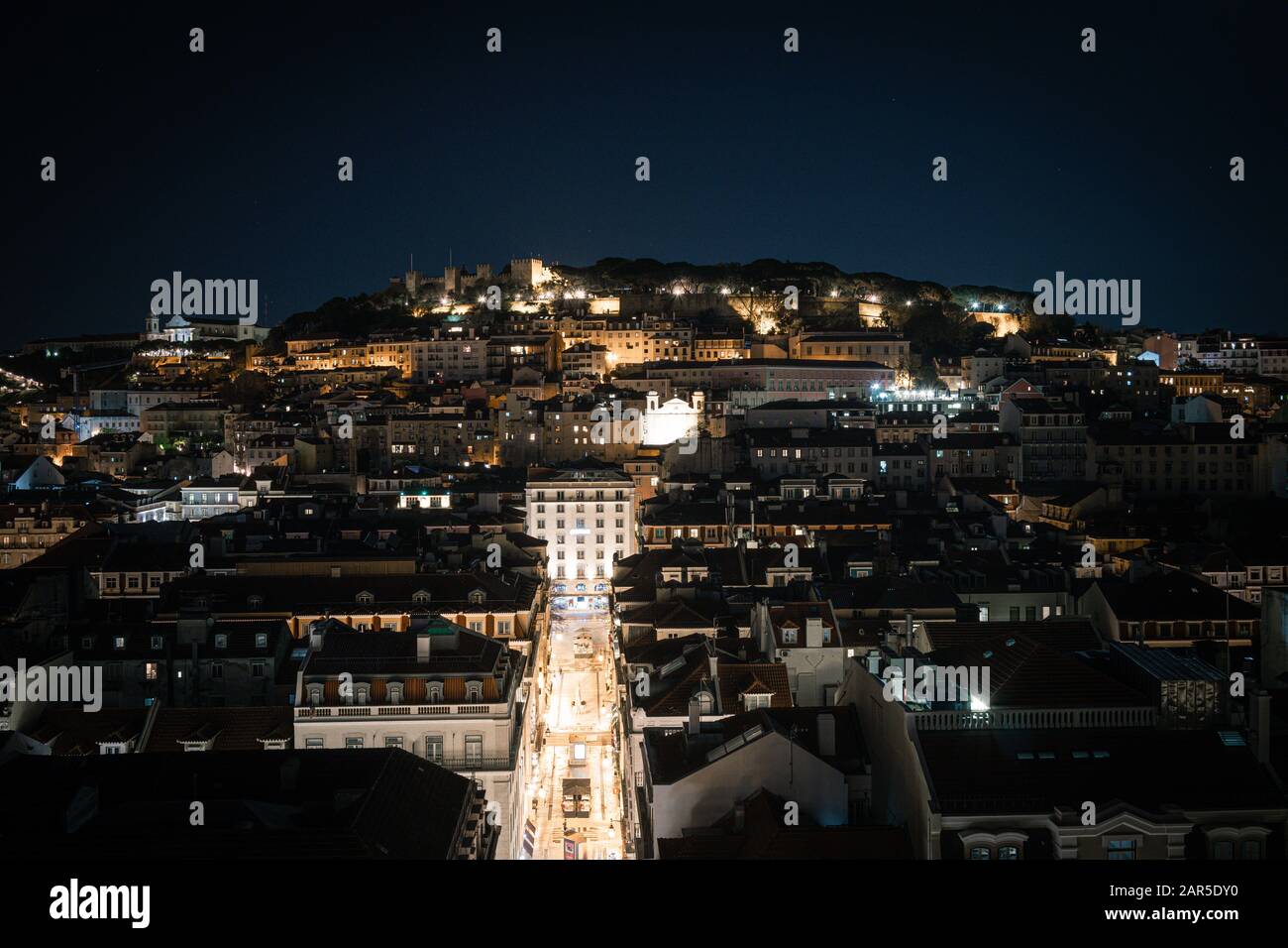 Nightime streets in Lisbon Stock Photo - Alamy