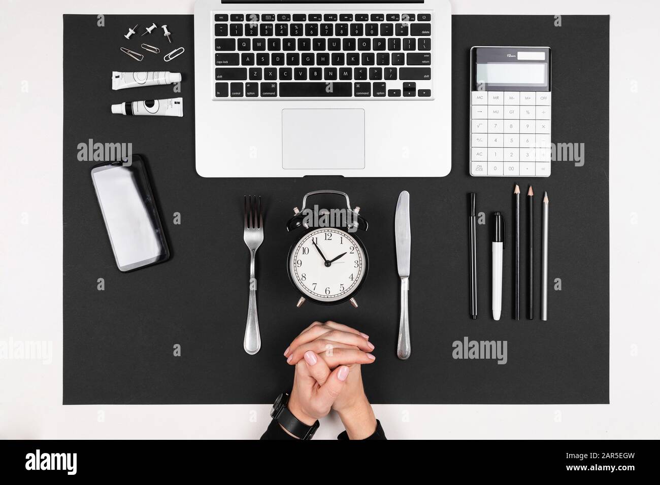 Desktop in break time isolated on black background Stock Photo - Alamy
