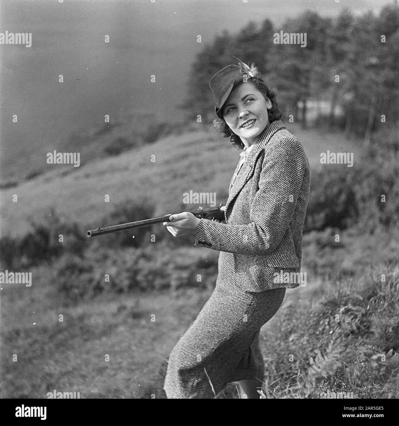 Grouse hunting on Skye Hunting. Woman with a shotgun Date: undated ...