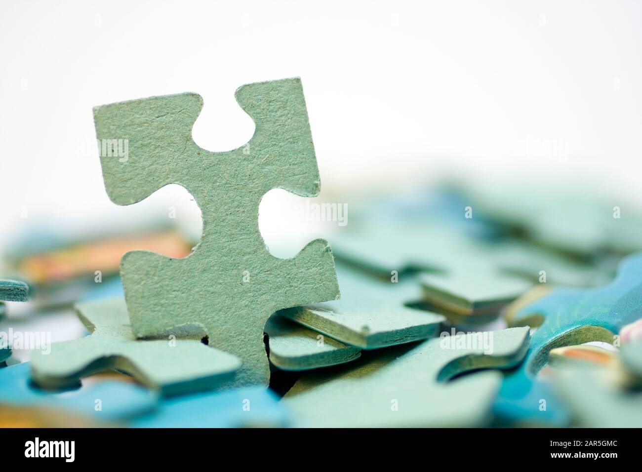 Jigsaw puzzle pieces falling hi-res stock photography and images - Alamy