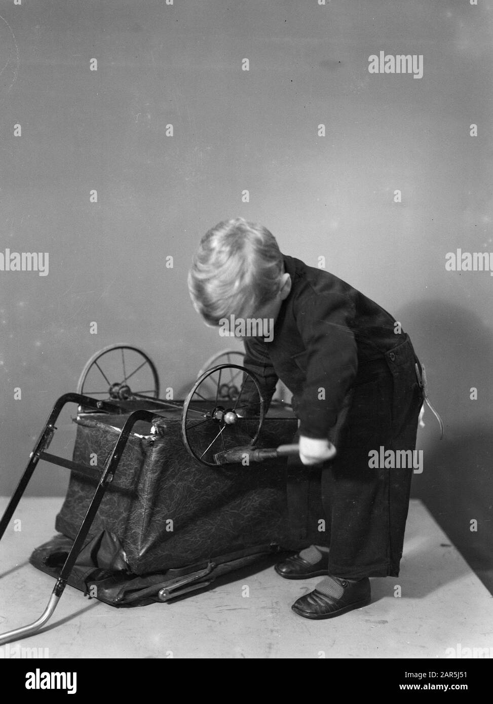 Children's portraits Johnny Benjamin with a flipped stroller Date ...