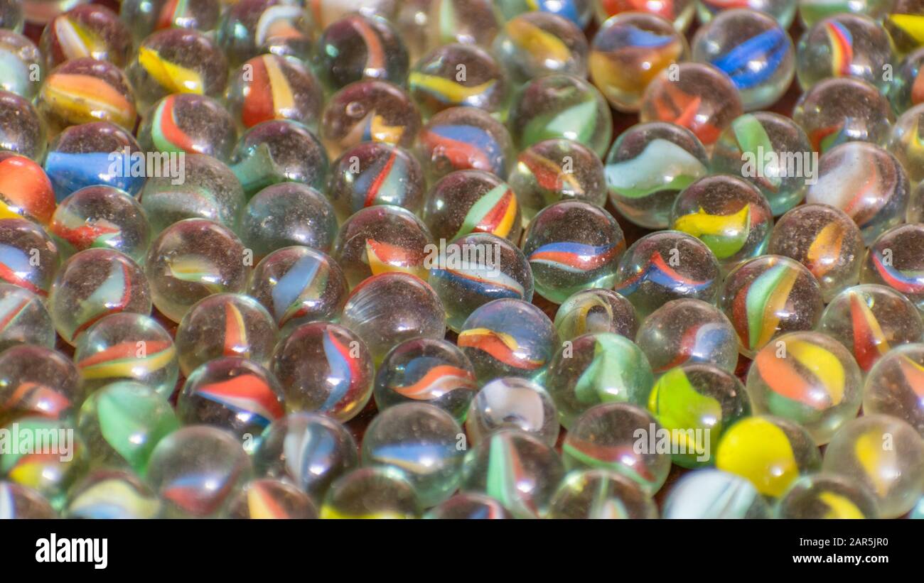 Glass marbles toy hi-res stock photography and images - Alamy