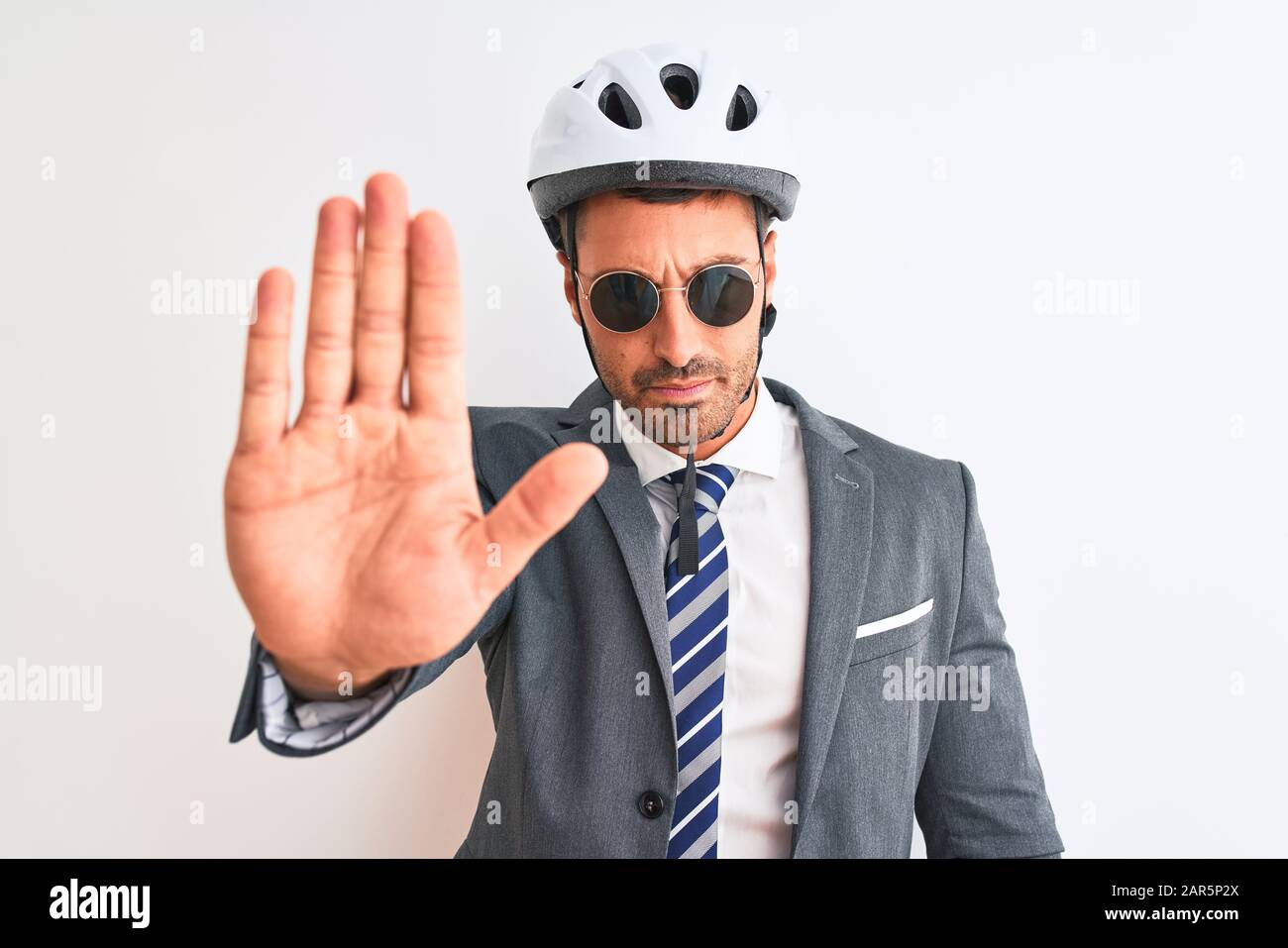 Young Handsome Business Man Wearing Bike Helmet And Sunglasses Over
