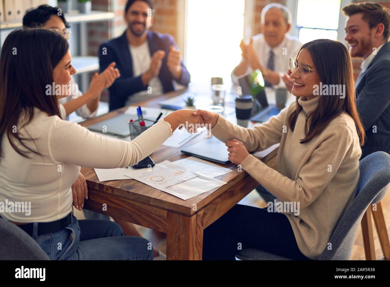 Group of business workers smiling happy and confident. Working together ...