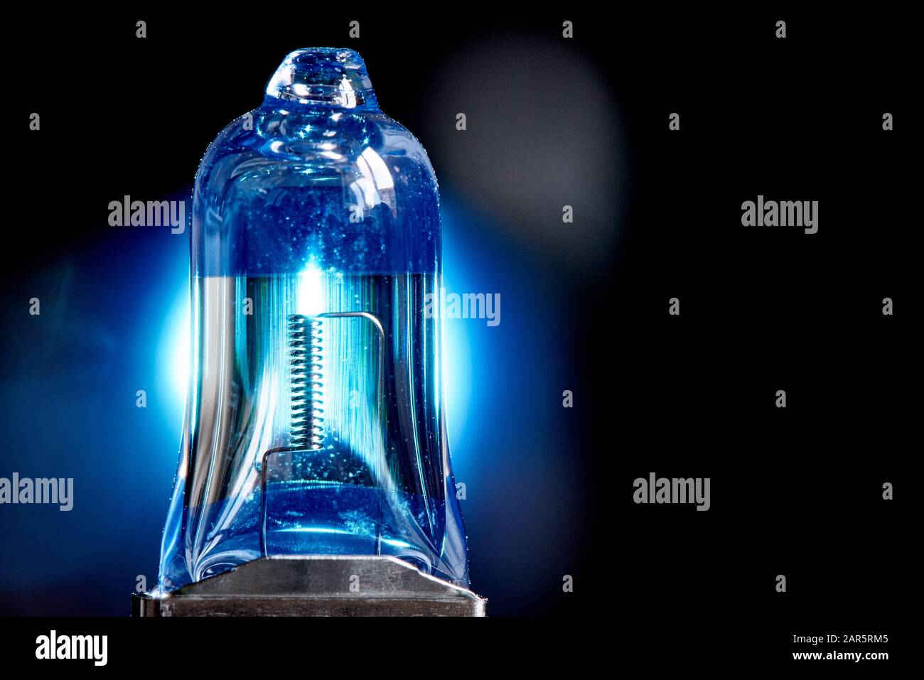 Spare light bulb for a car's headlights on black background.Сopy space ...