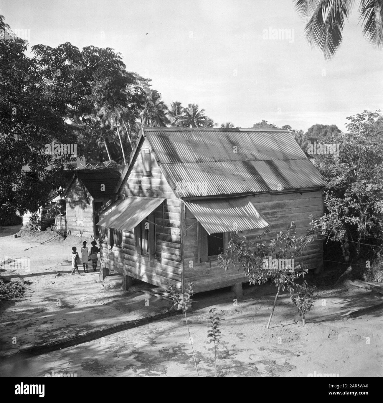 Travel to Suriname and the Netherlands Antilles Children in front of a ...