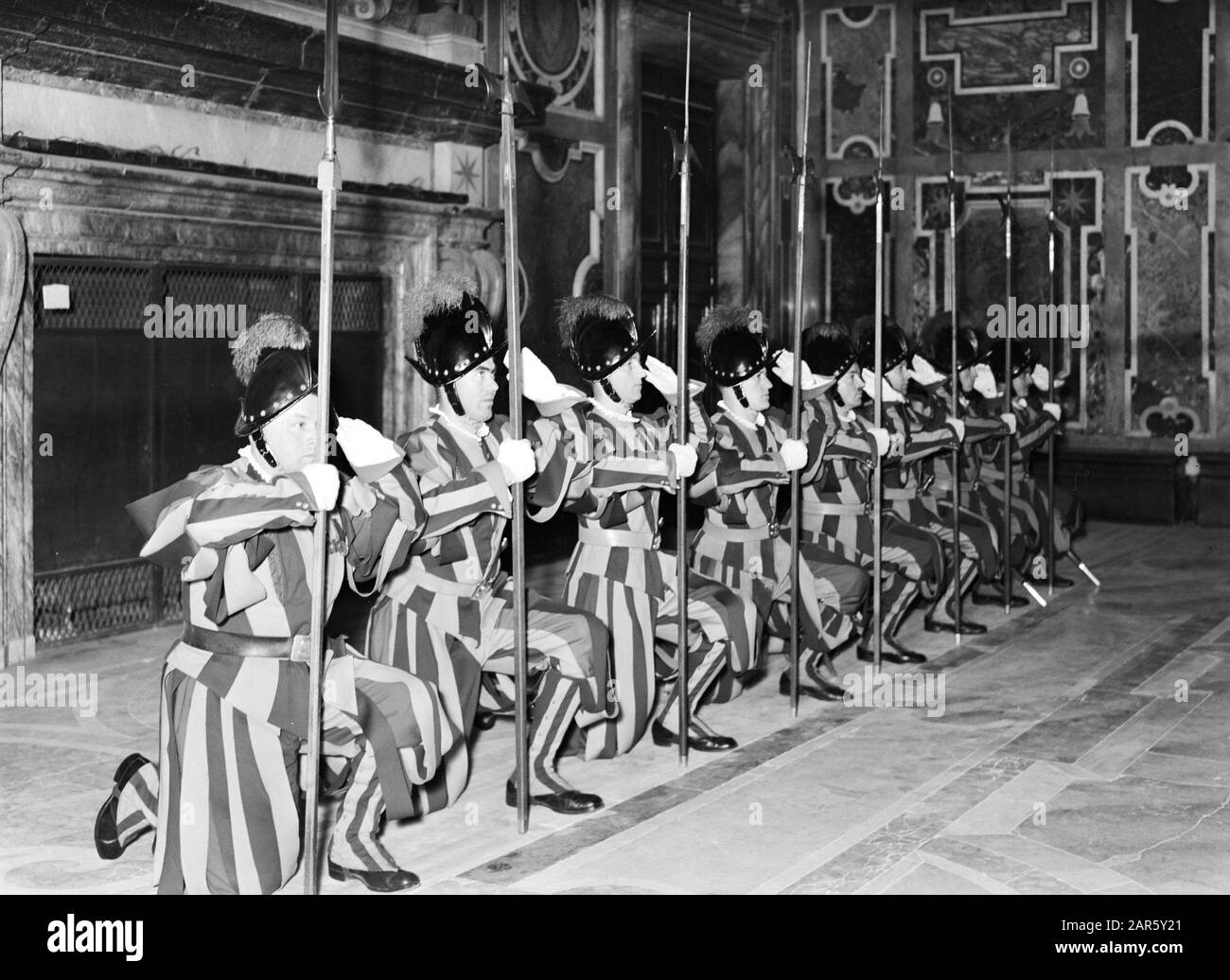 Rome: The Papal Swiss Guard in Vatican City Kneeling salute of the ...