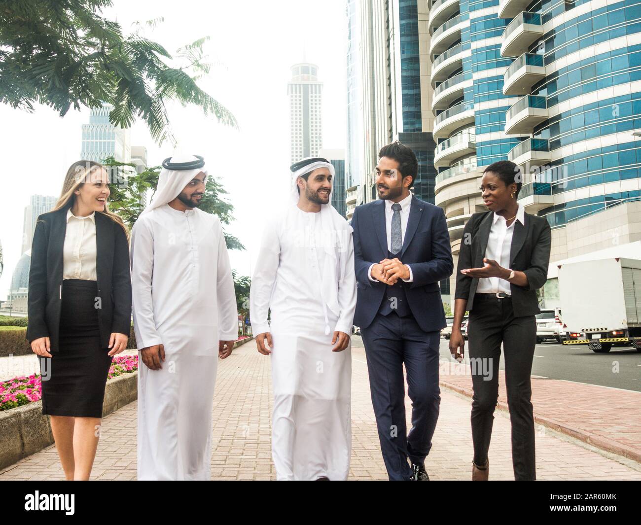 Multi-ethnic group of people on a business meeting in the UAE ...