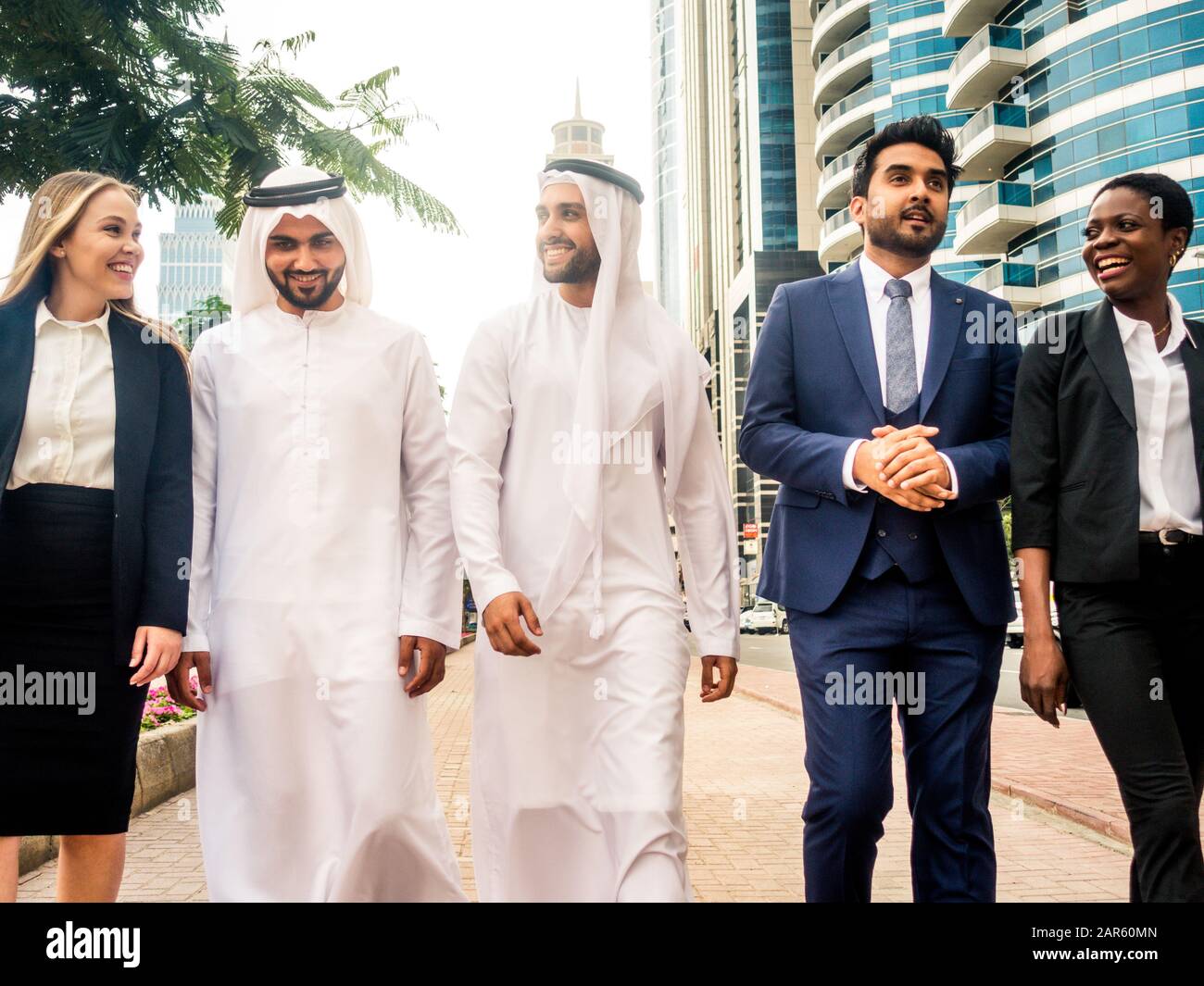 Multi-ethnic group of people on a business meeting in the UAE ...