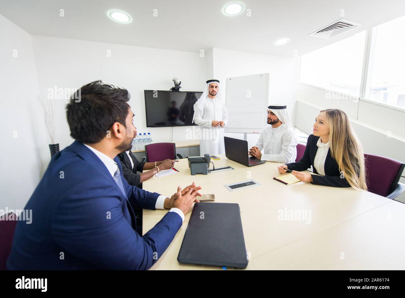 Multiracial group of business people having a meeting in a office ...