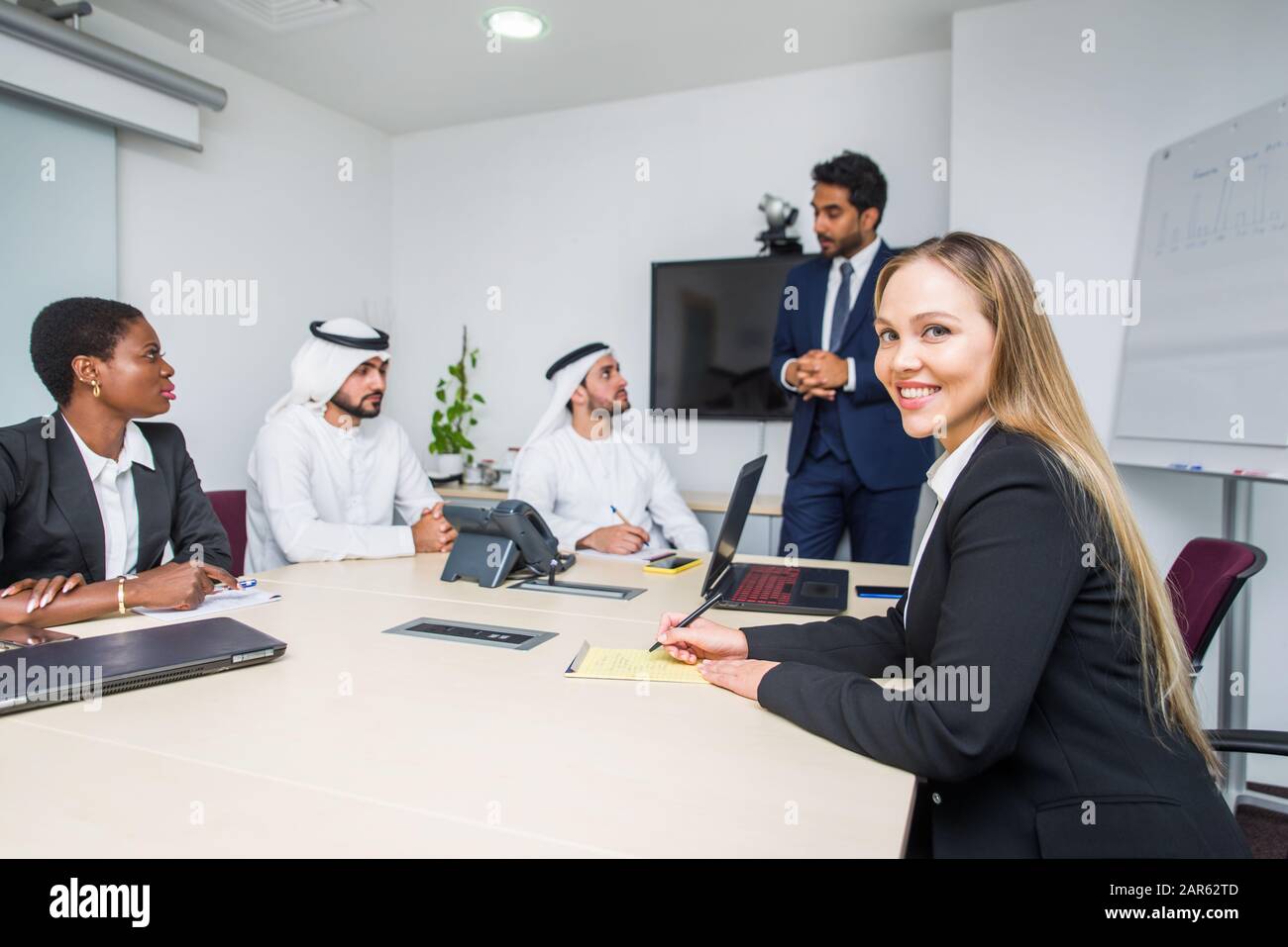 Multiracial group of business people having a meeting in a office ...