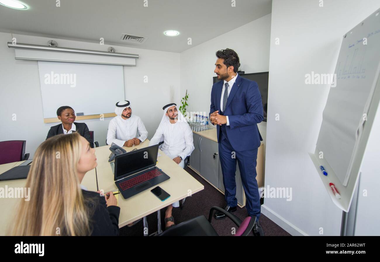 Multiracial group of business people having a meeting in a office ...