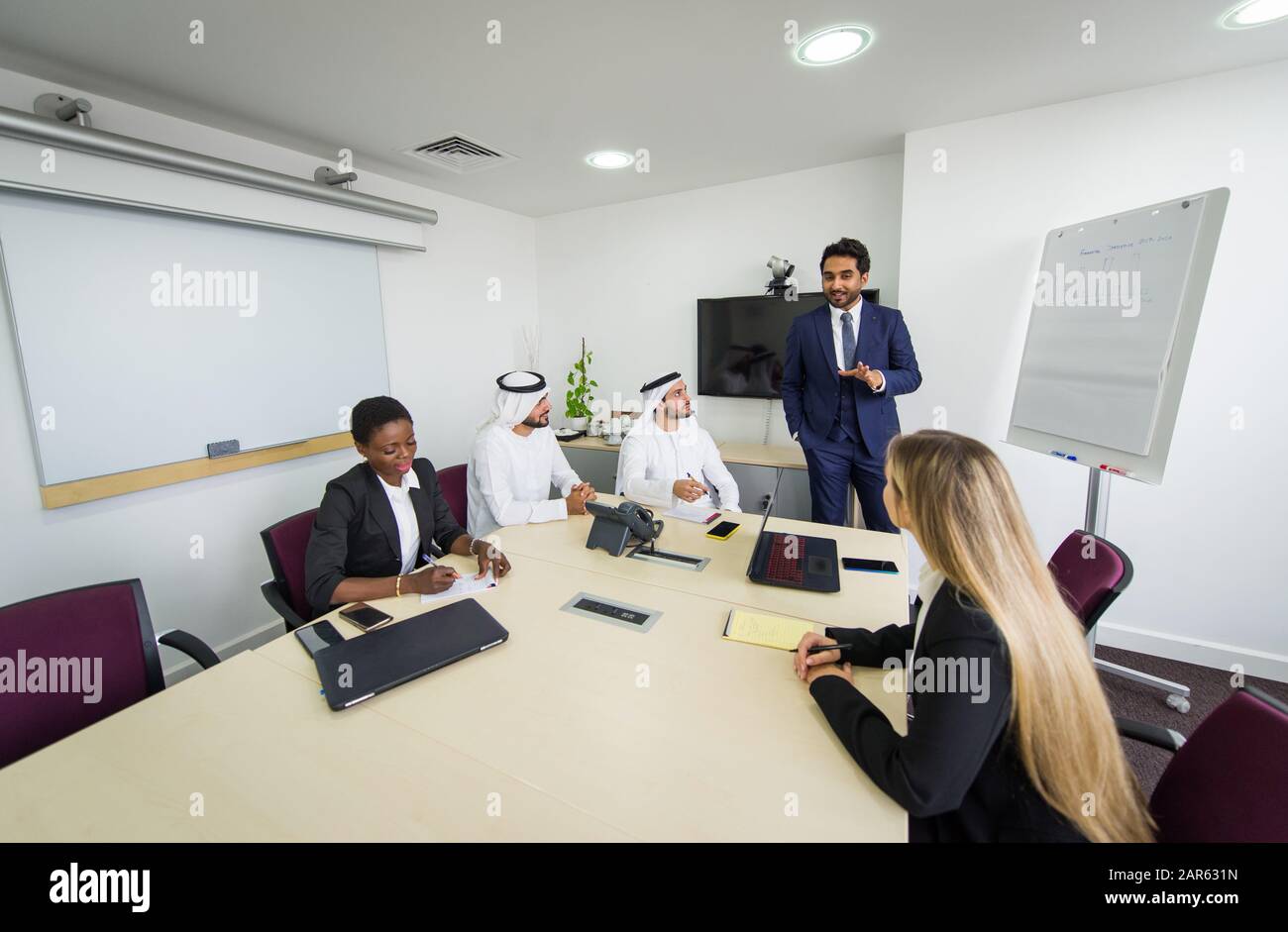 Multiracial group of business people having a meeting in a office ...