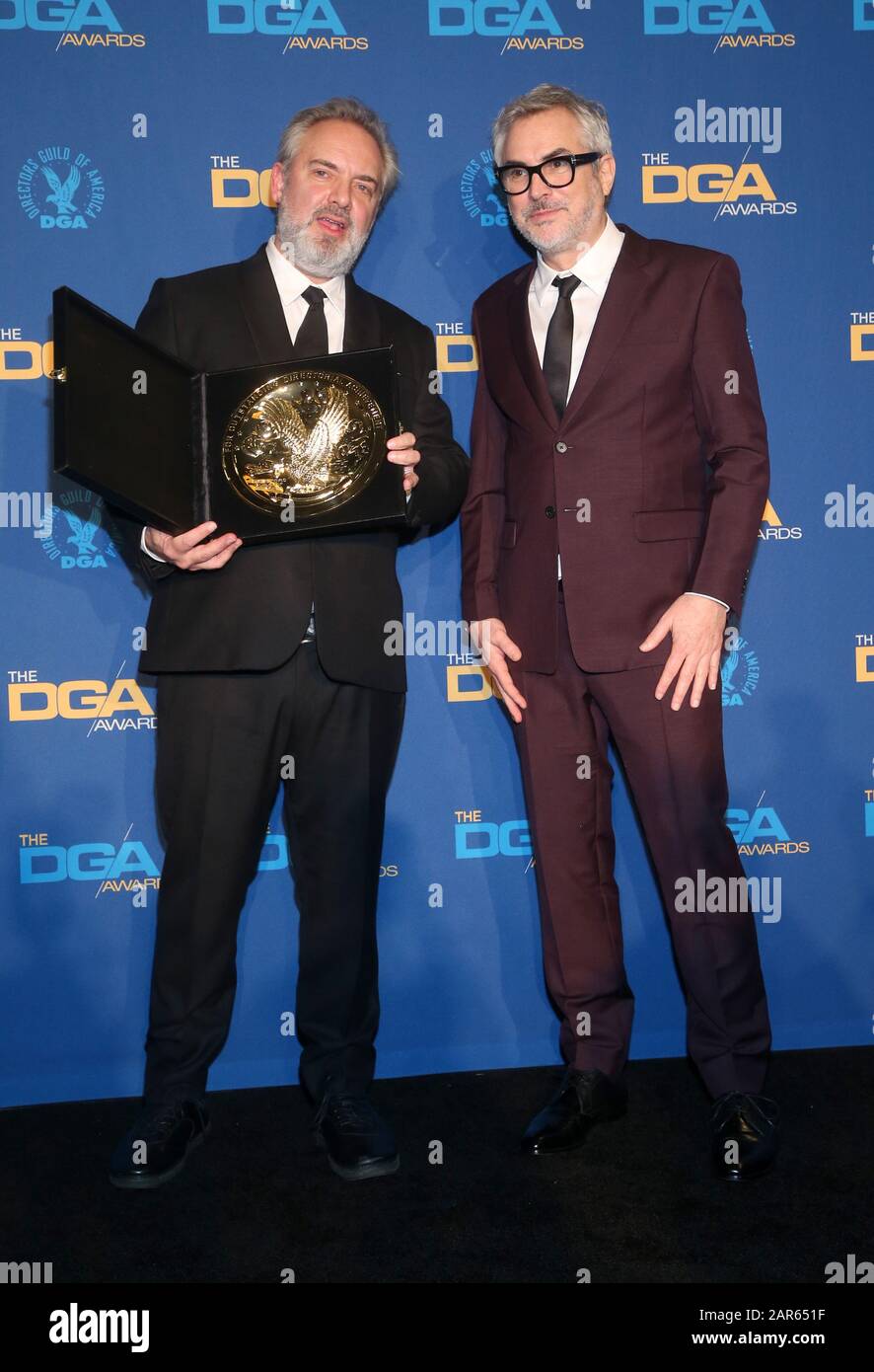 LOS ANGELES, CA - JANUARY 25: Sam Mendes, Alfonso Cuarón, at the 72nd ...