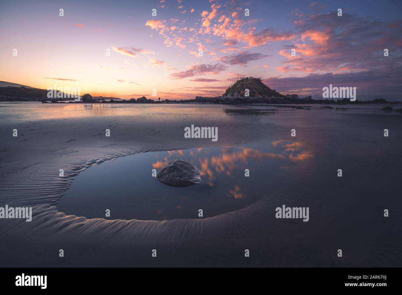Monkey Island during sunset, New Zealand Stock Photo - Alamy