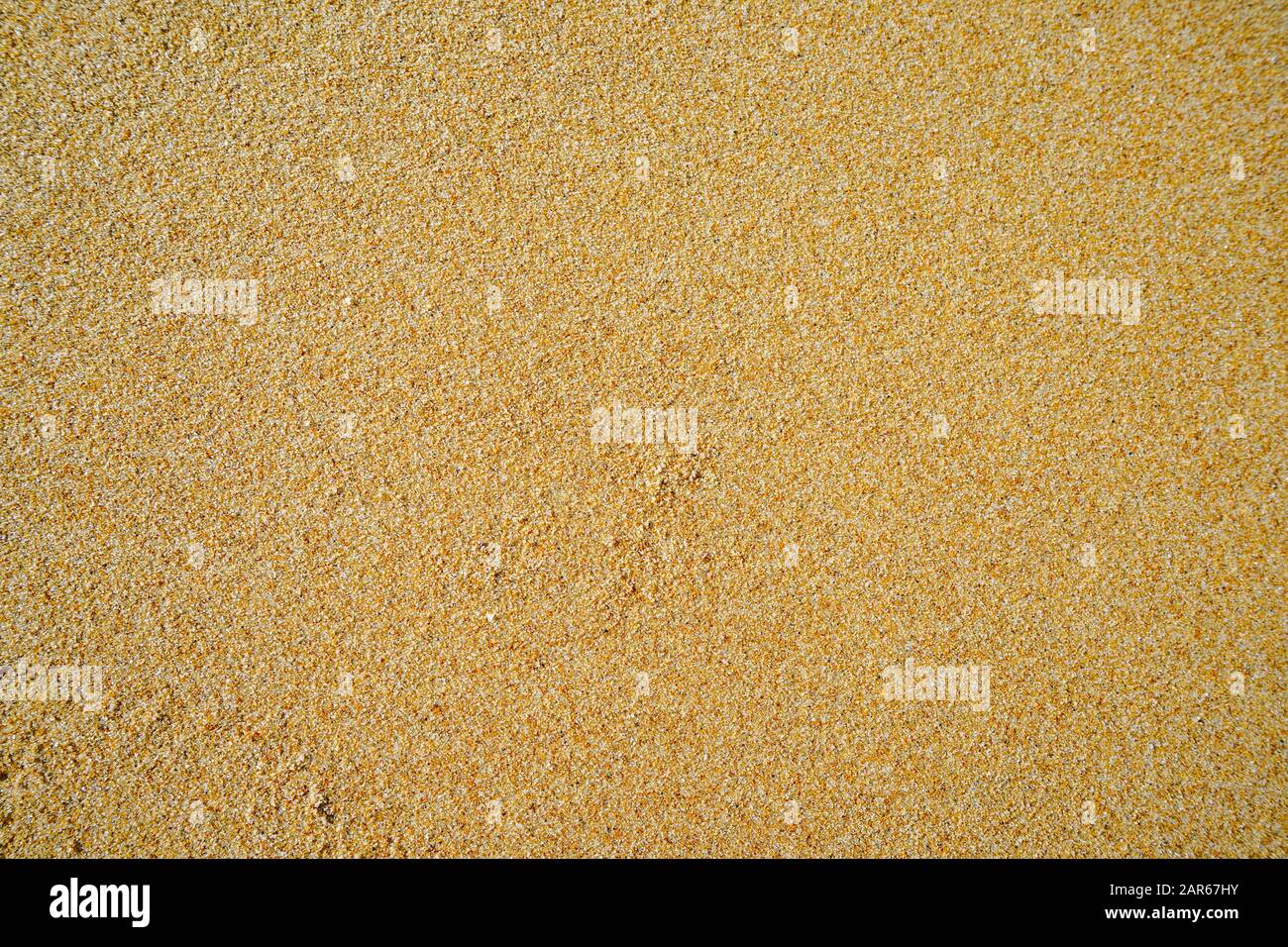 Natural background with yellow sand Stock Photo - Alamy