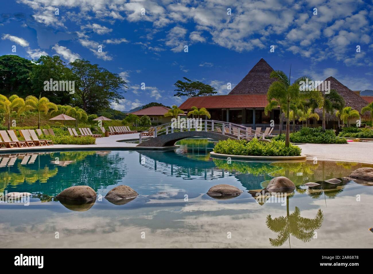Bridge over swimming pool hi-res stock photography and images - Alamy
