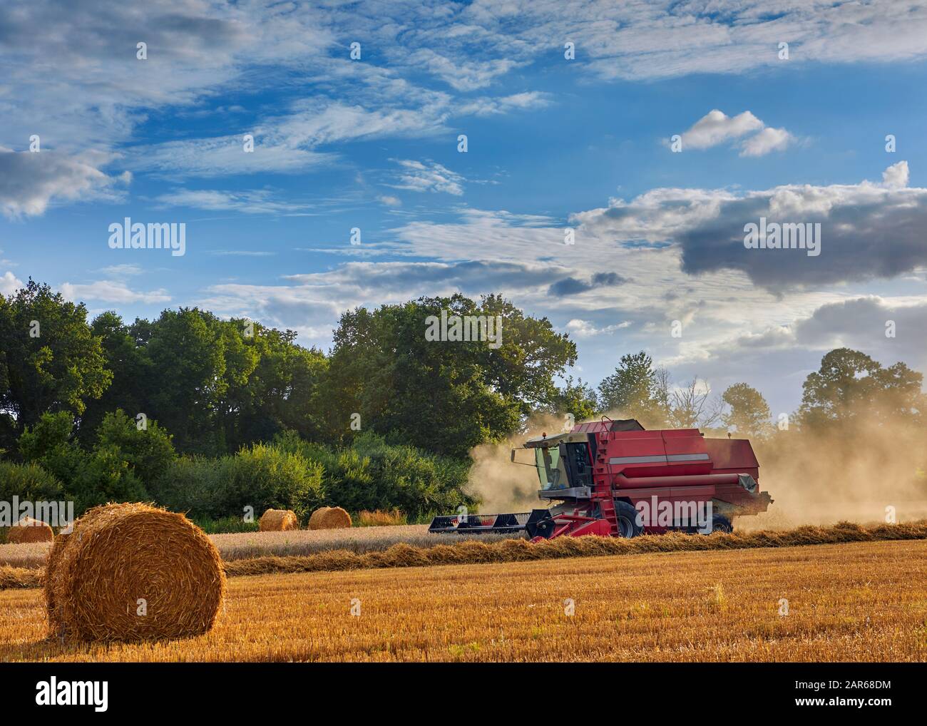 Combine harvester in the evening hi-res stock photography and images ...