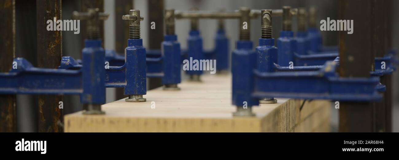 Blue metal clamp Stock Photo - Alamy
