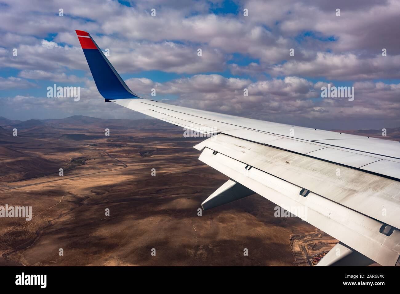 Canary Islands mountain landscape under airplane wing Stock Photo - Alamy