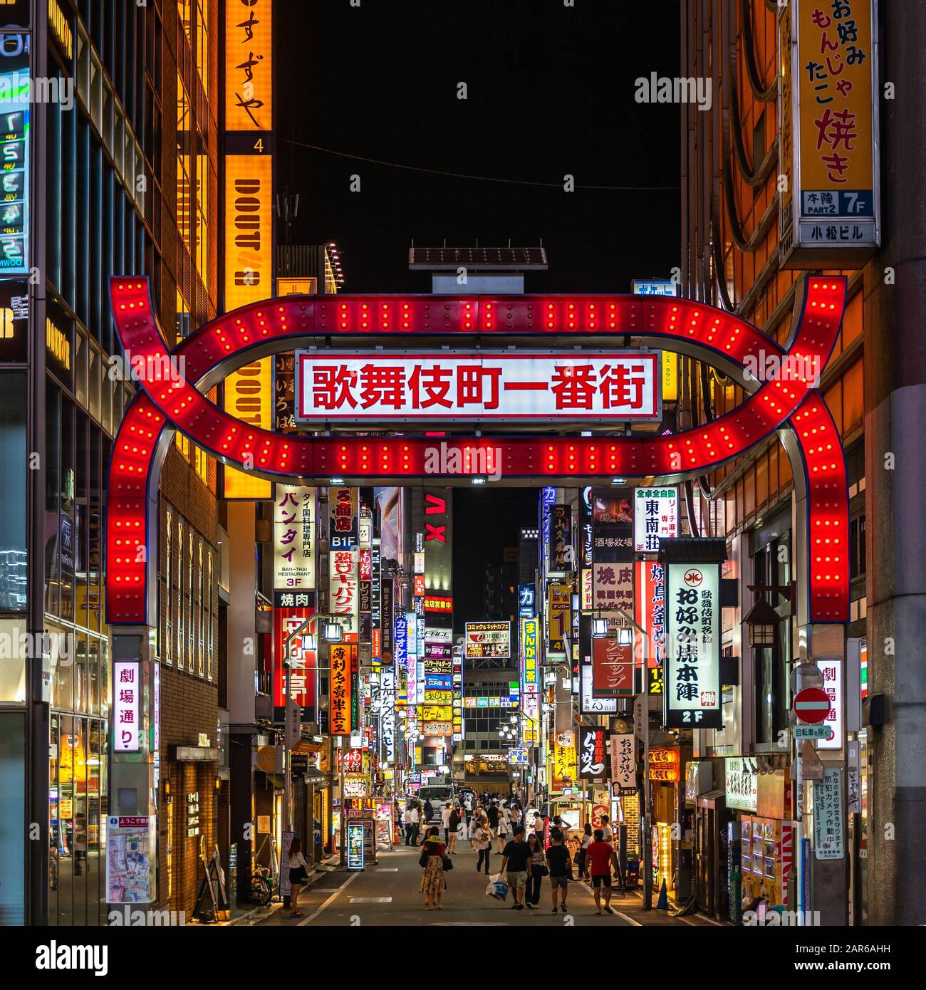 Tokyo, Japan, August 2019 - Kabukicho gate and the colorful neon street ...