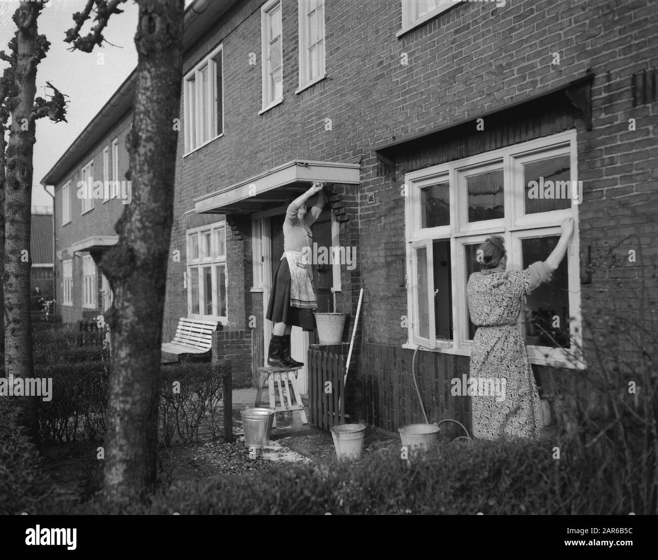 Homes in the back Black and White Stock Photos & Images - Alamy