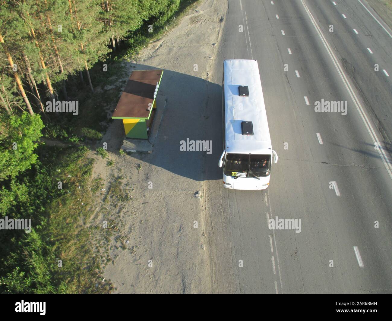 Long distance bus near bus stop Stock Photo - Alamy