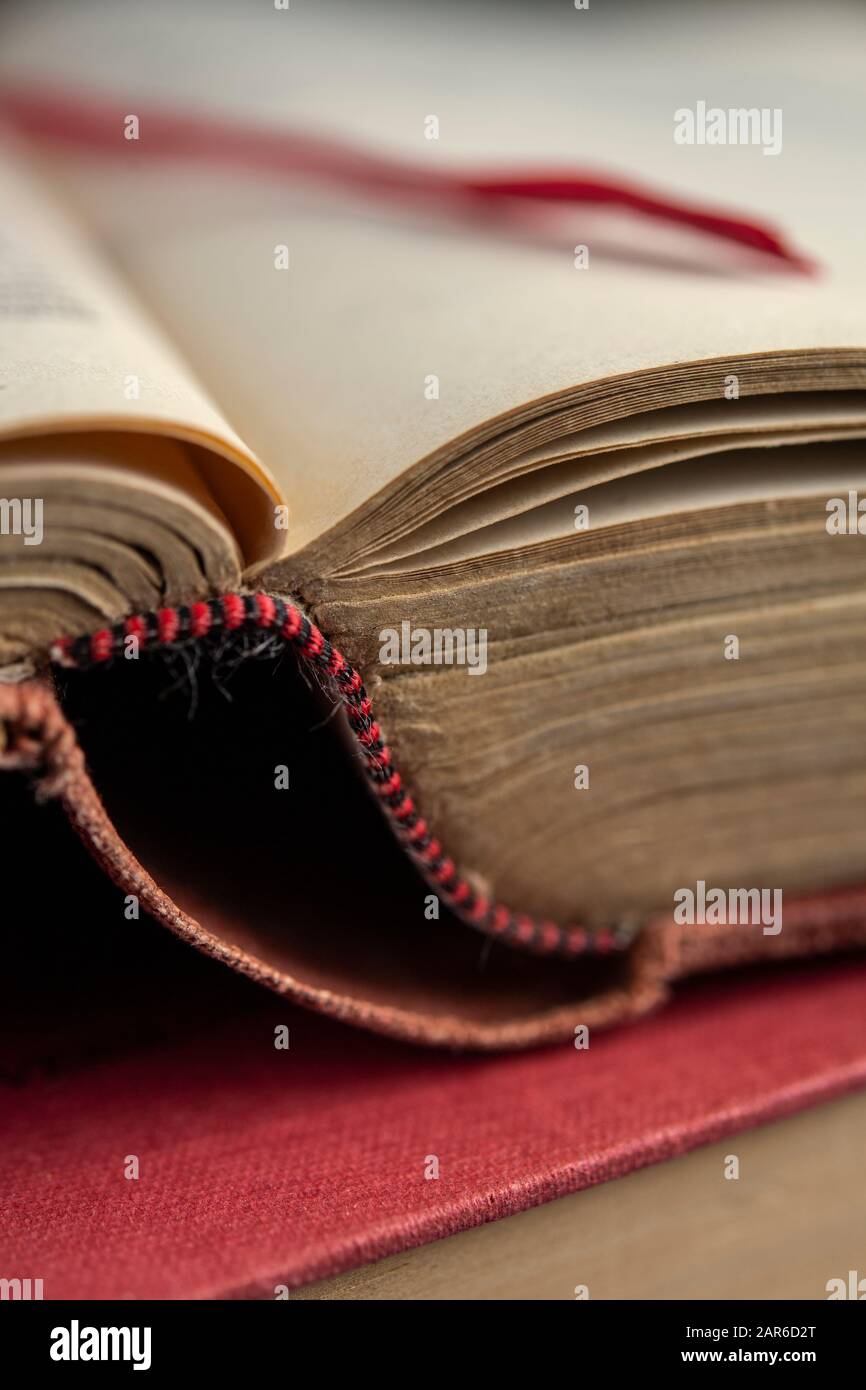 Open book red ribbon hi-res stock photography and images - Alamy