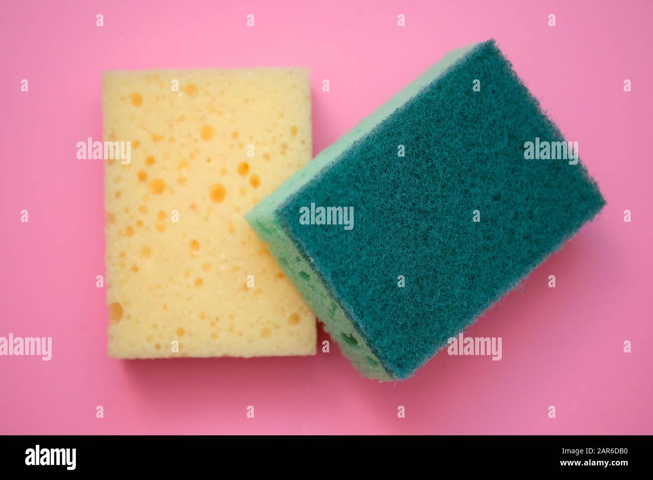 New foam sponges for washing dishes. Green and yellow sponge top view ...