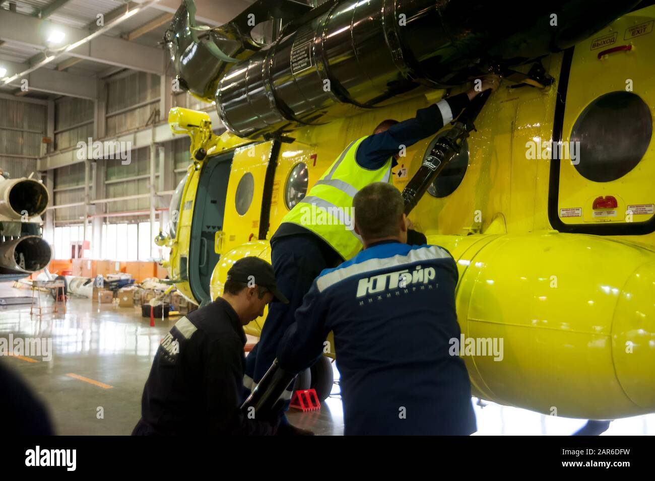 Maintenance of MI-8 helicopter gear Stock Photo - Alamy