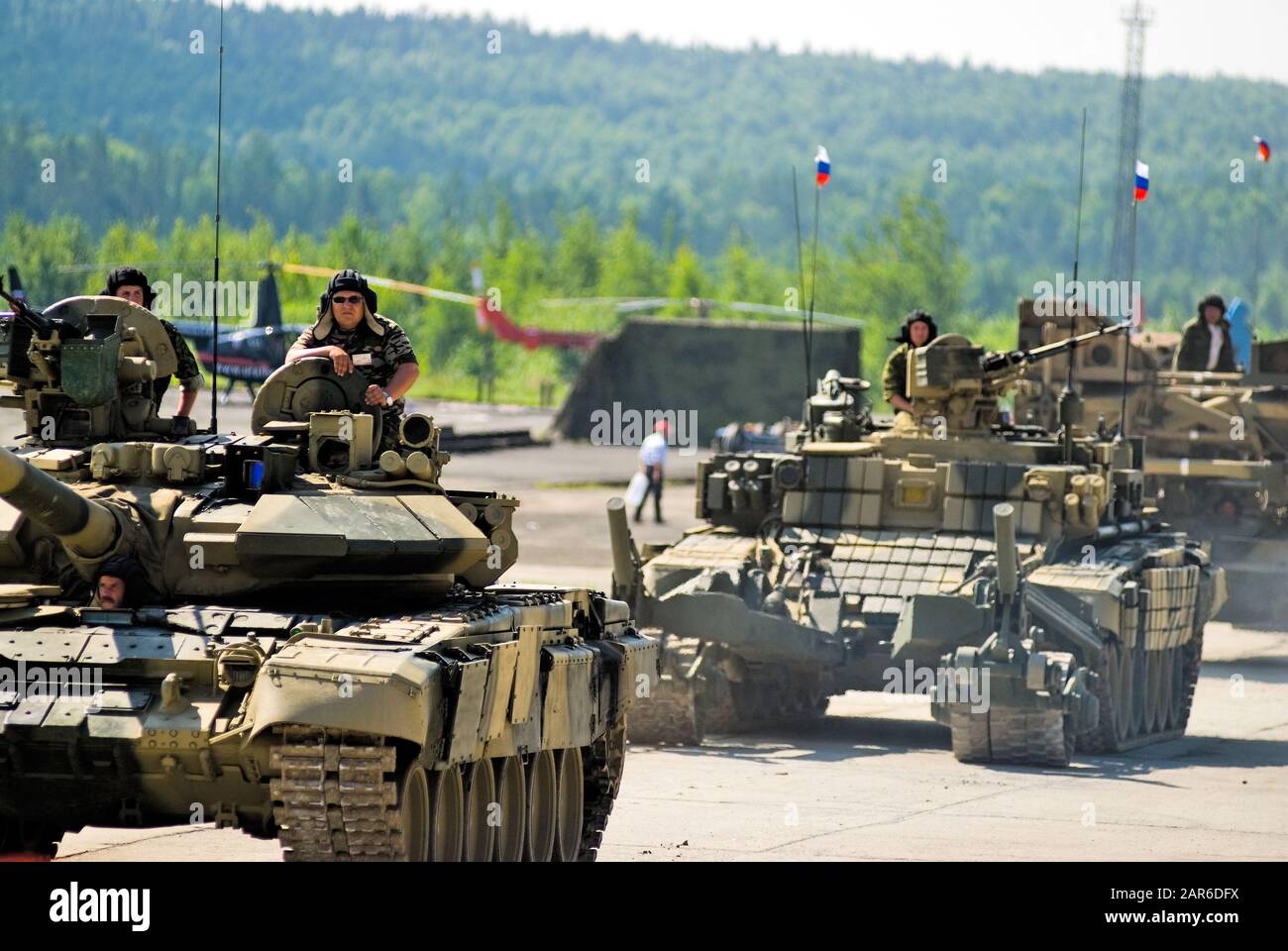 Modernized tank T-72 and convoy in motion. Russia Stock Photo - Alamy