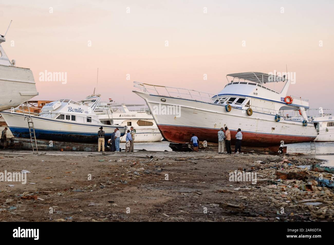 Parking of old tourist yacht in Hurghada port Stock Photo - Alamy