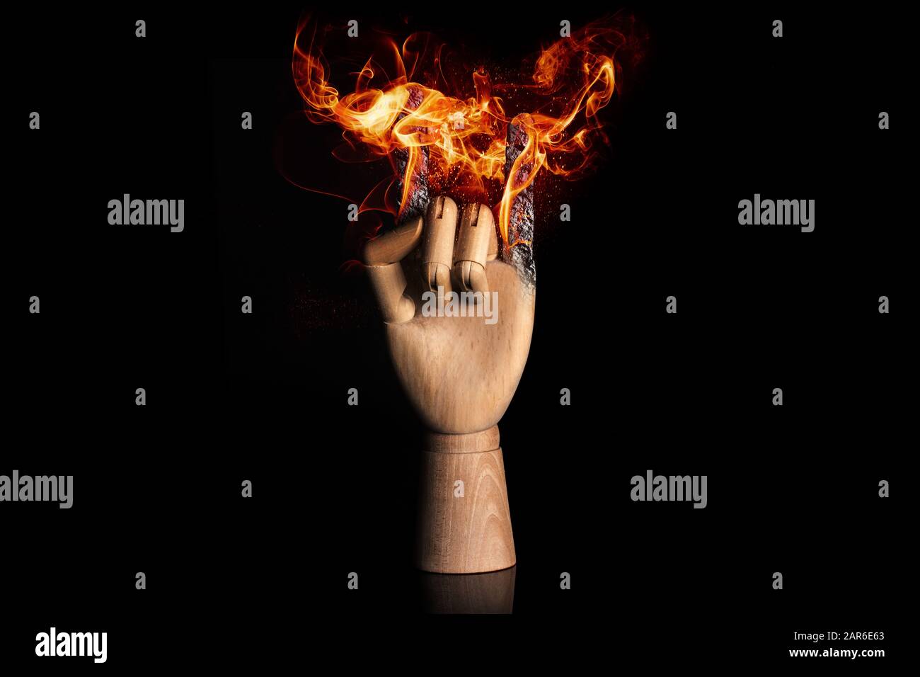 Struggle sign in burning fire isolated on black glass Stock Photo - Alamy