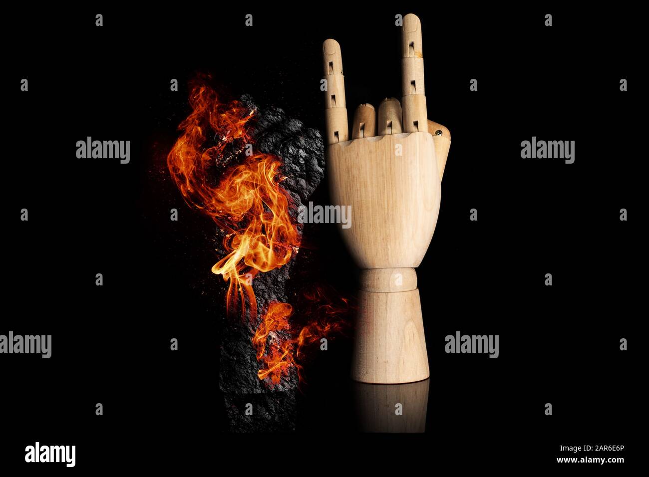 Struggle sign in burning fire isolated on black glass Stock Photo - Alamy
