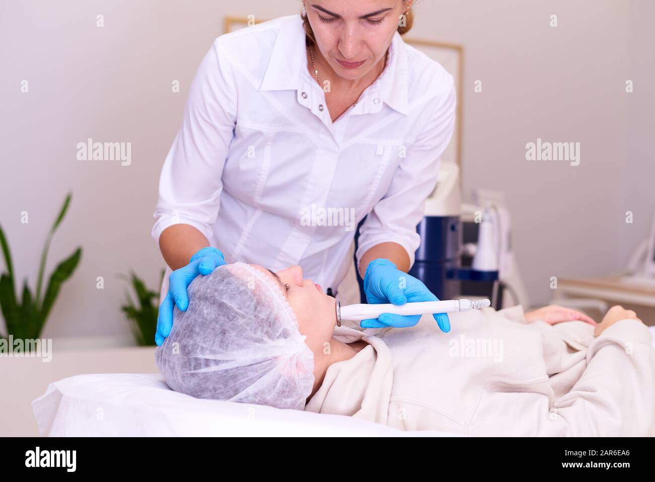 RF face lifting procedure in a cosmetology clinic Stock Photo - Alamy