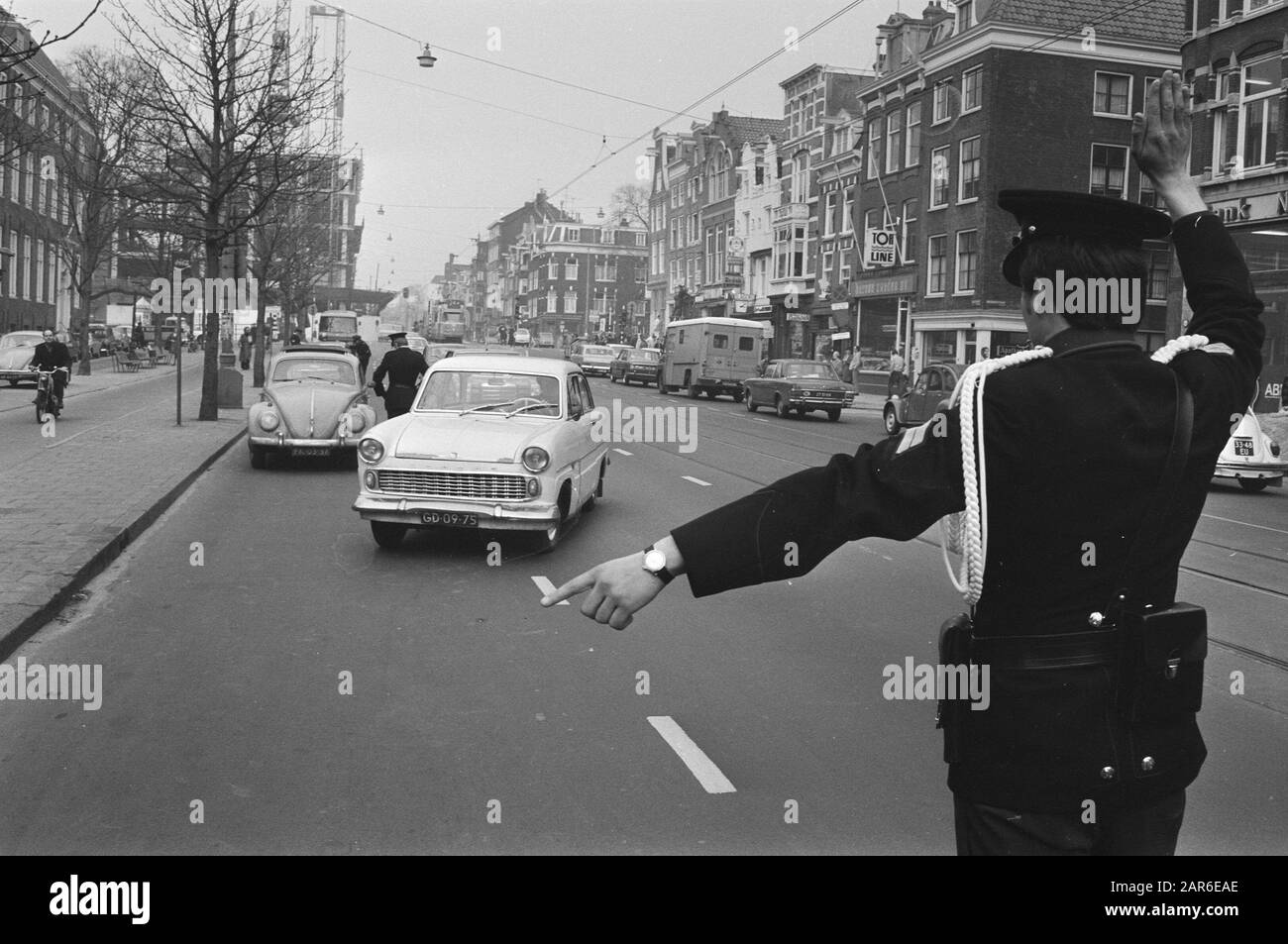 Police control of cars at Amsterdam Marechaussee gives stop sign Date ...
