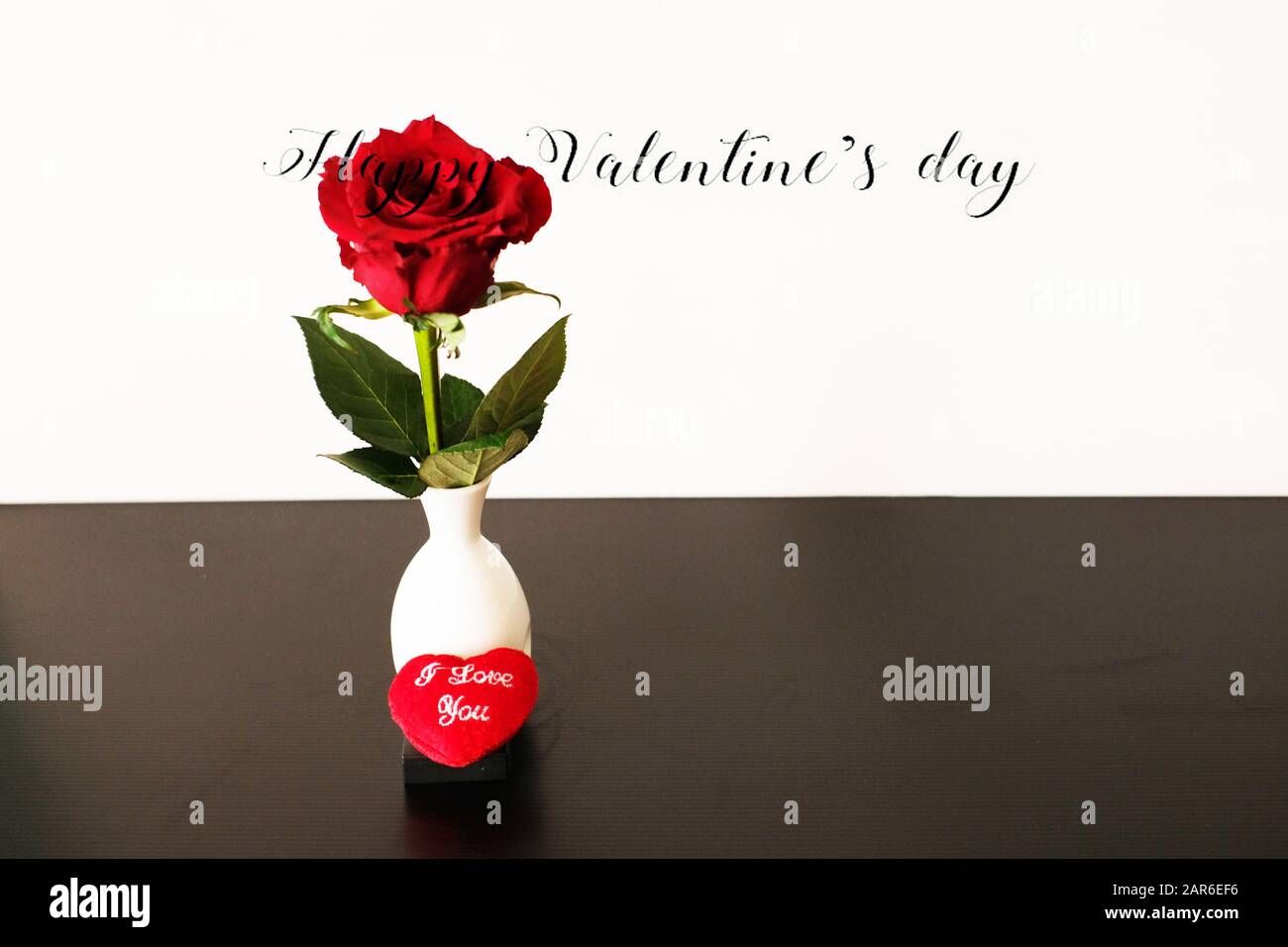 Single red rose in vase for Valentine festival Stock Photo - Alamy