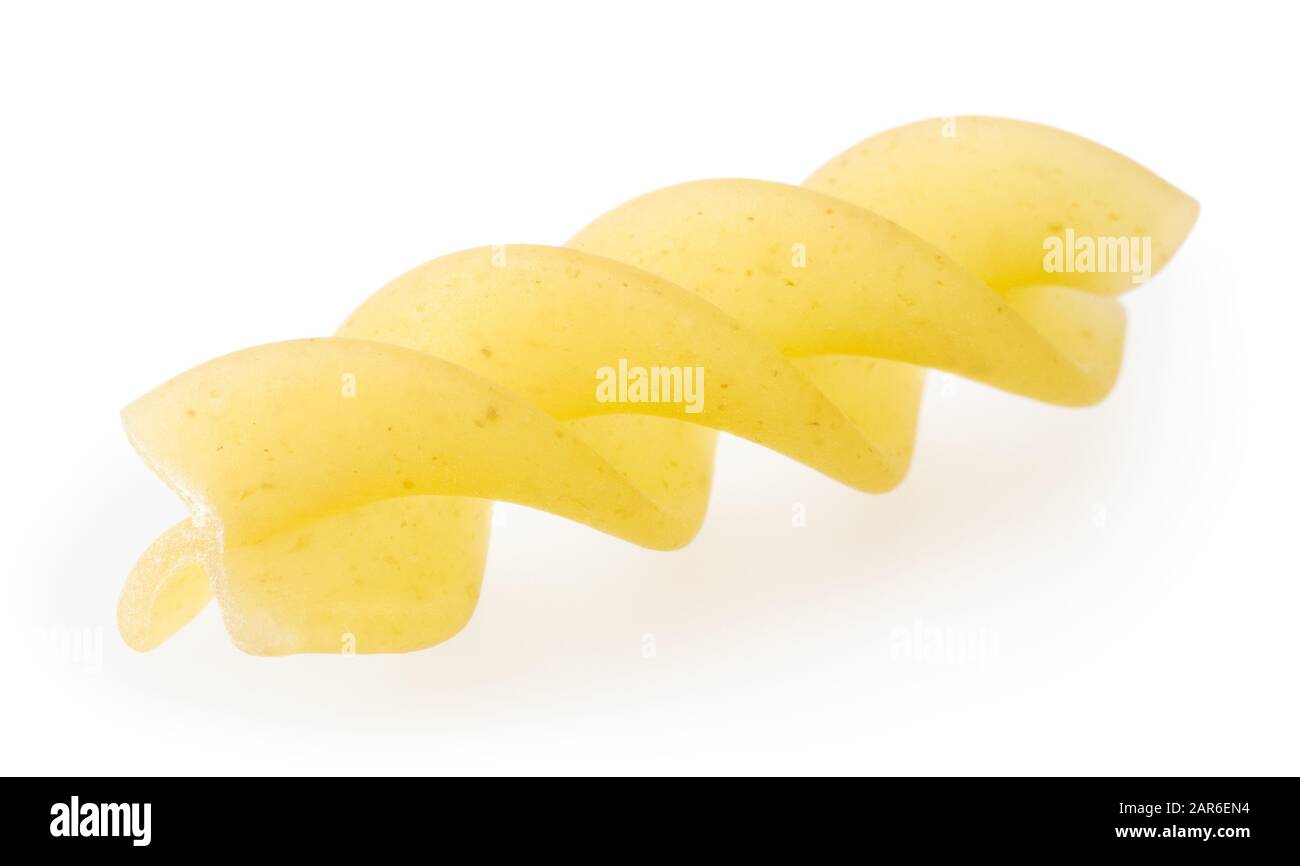 Uncooked fusilli pasta isolated on white background with clipping path ...