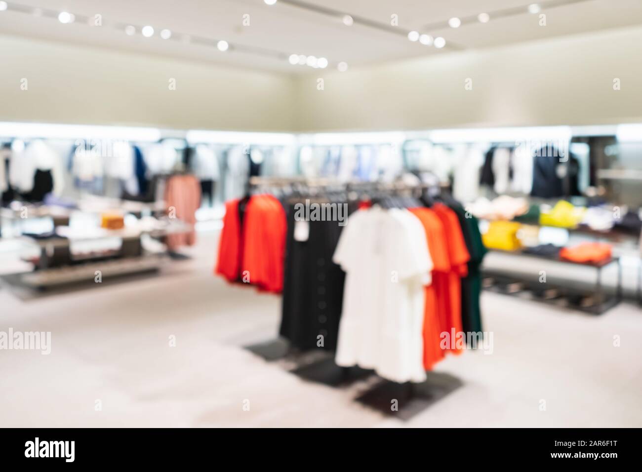 Abstract blurred of fashion boutique clothing store with bokeh use for ...