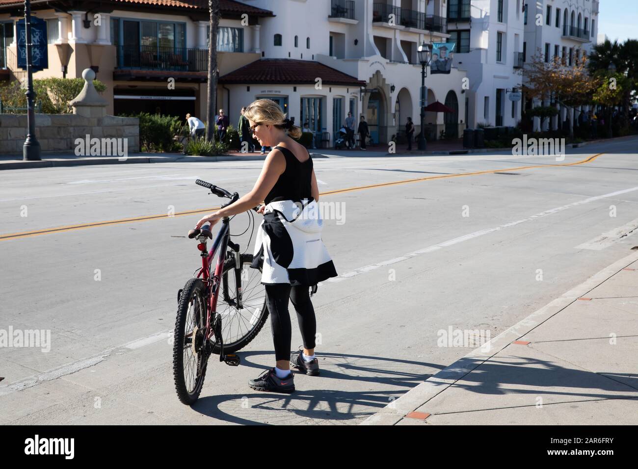 Lady standing with her bike hi-res stock photography and images - Alamy