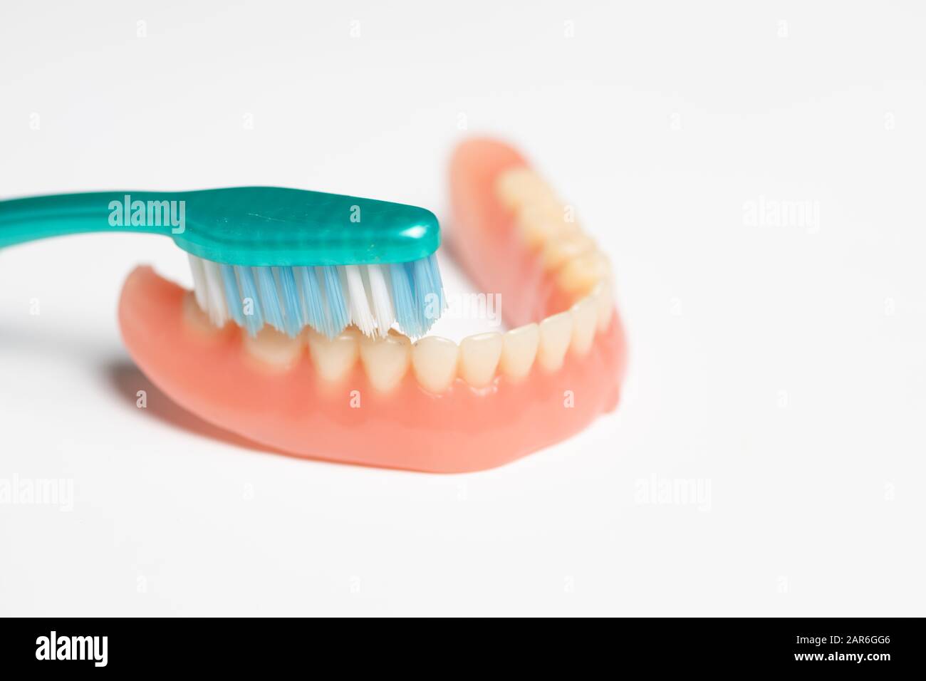 Denture and toothbrush, dental cleaning instruction, cleaning care ...