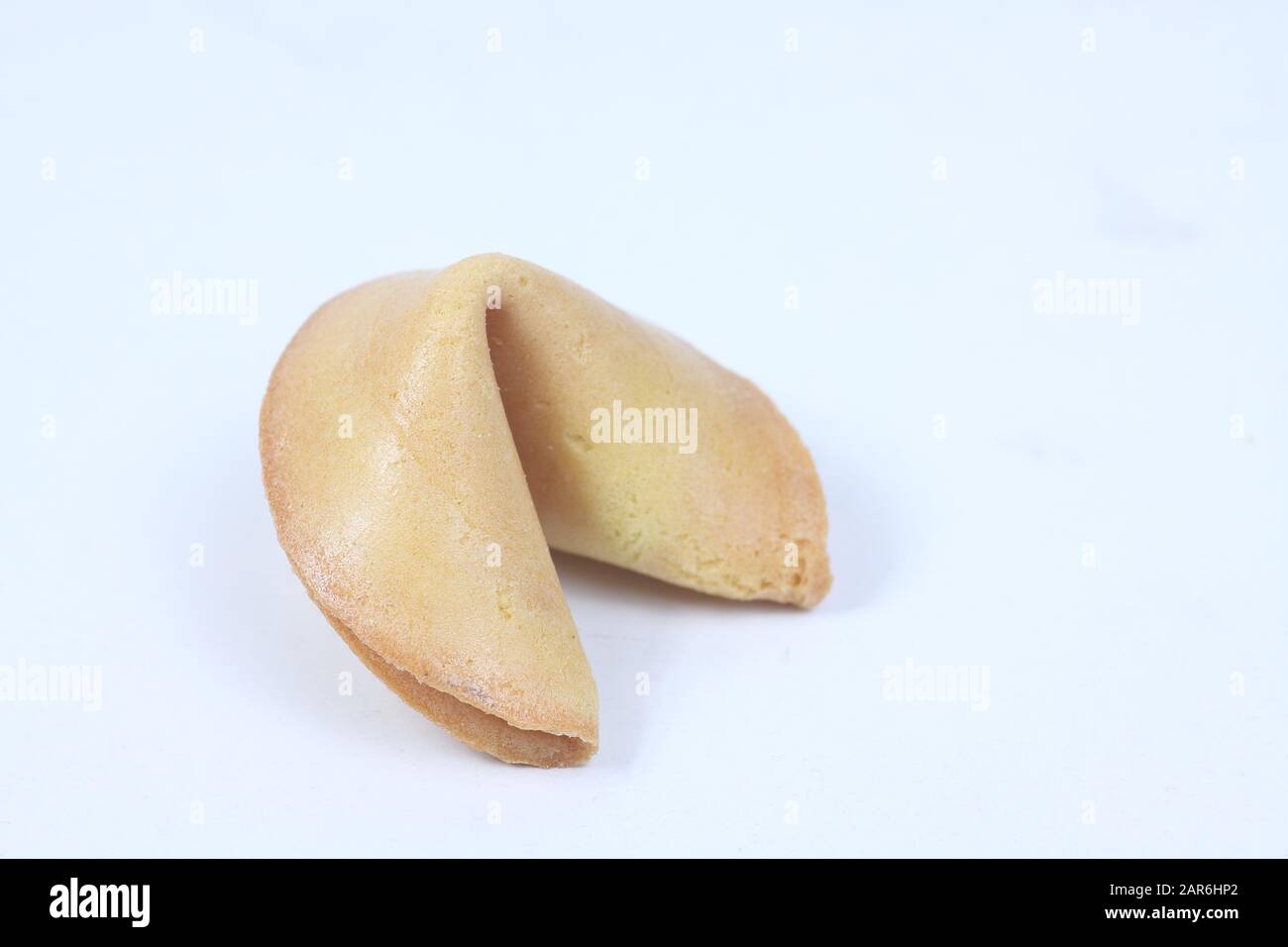 fortune cookie isolated on white background Stock Photo - Alamy
